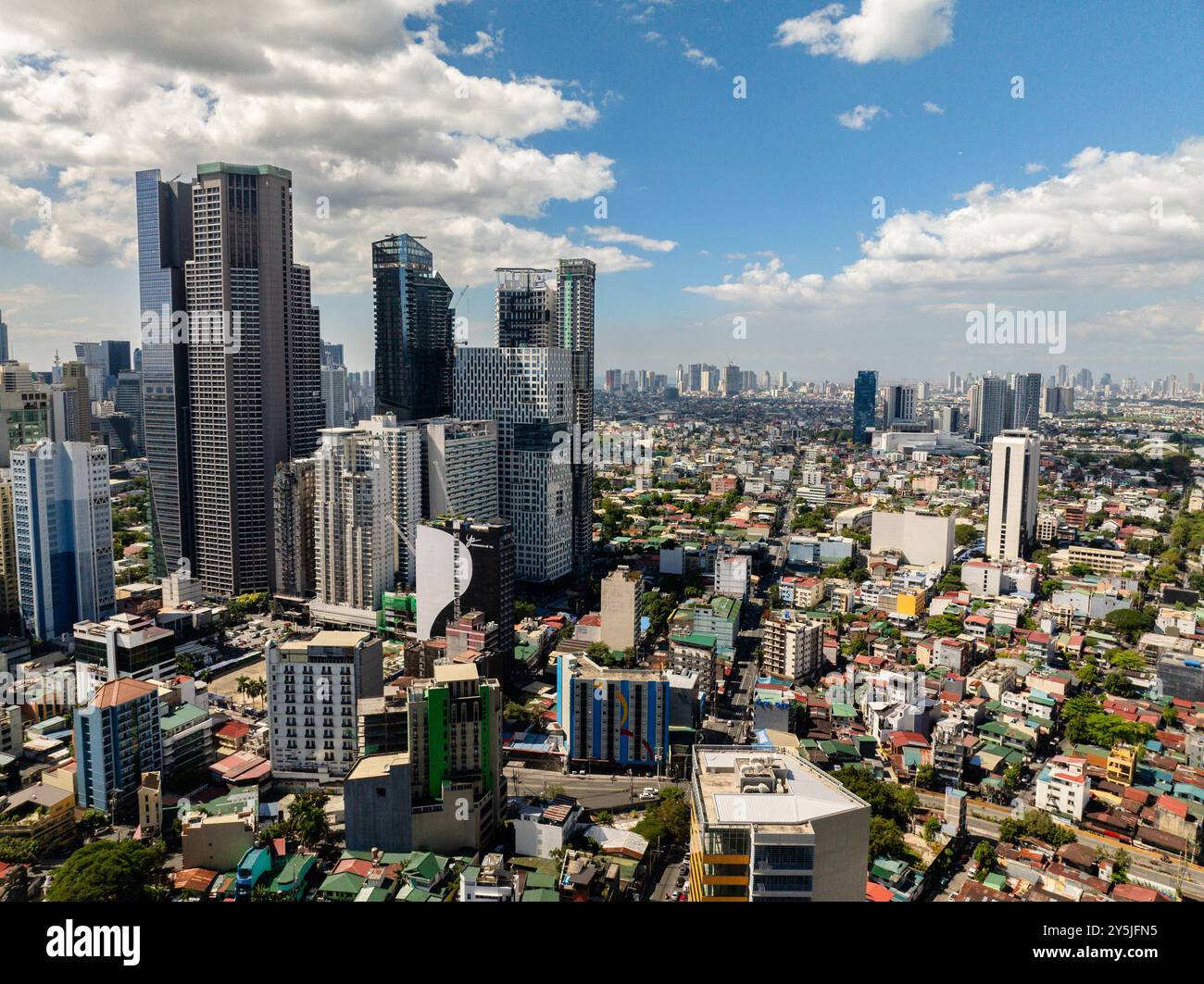 Makati City with skyscrapers and high rise towers. Metro Manila ...