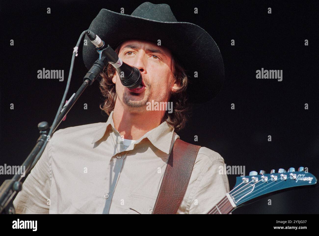 Dave Grohl, lead singer of the Foo Fighters plays Reading Festival 1998 ...