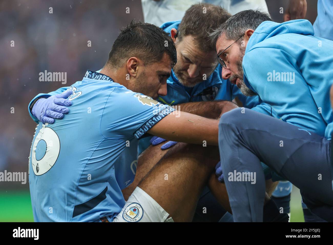 Rodri of Manchester City receives treatment for an injury during the ...