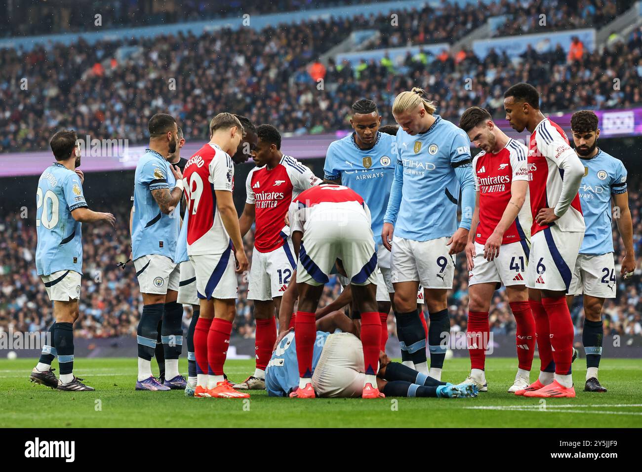 Rodri of Manchester City receives treatment for an injury during the ...