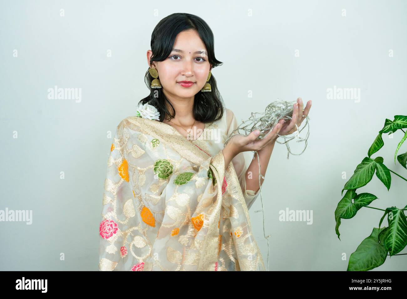 Beautiful Asian Female in Kurtha for Diwali giving Expressions ...