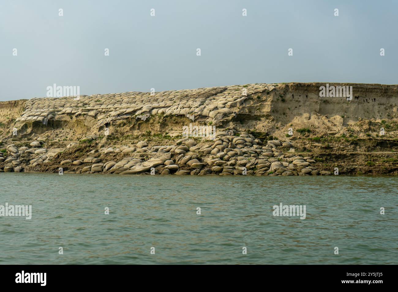 Sandbags, geobags to protect riverbank from erosion and flooding ...