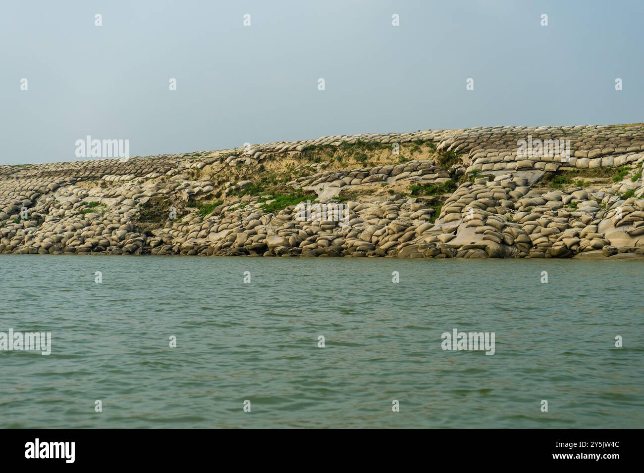 Sandbags, geobags to protect riverbank from erosion and flooding ...