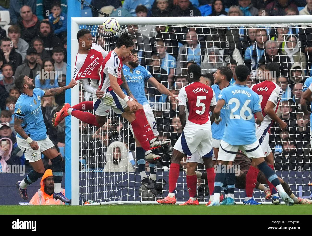 Arsenal's Gabriel scores their side's second goal of the game during ...