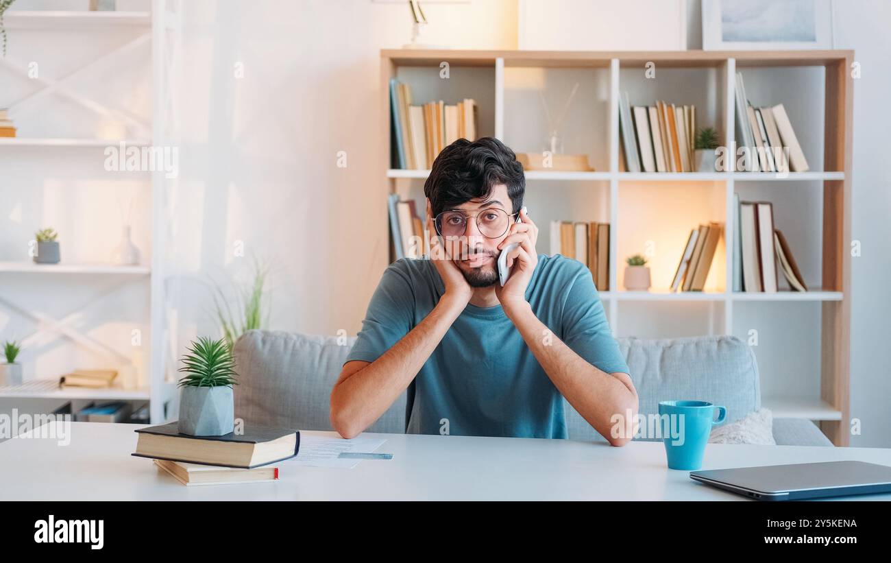 Sad call. Mobile disappointment. Bored tired dissatisfied annoyed guy ...