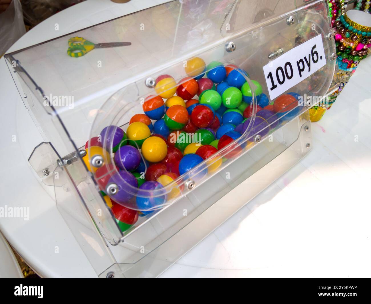 Lottery drum with colorful balls inside Stock Photo - Alamy