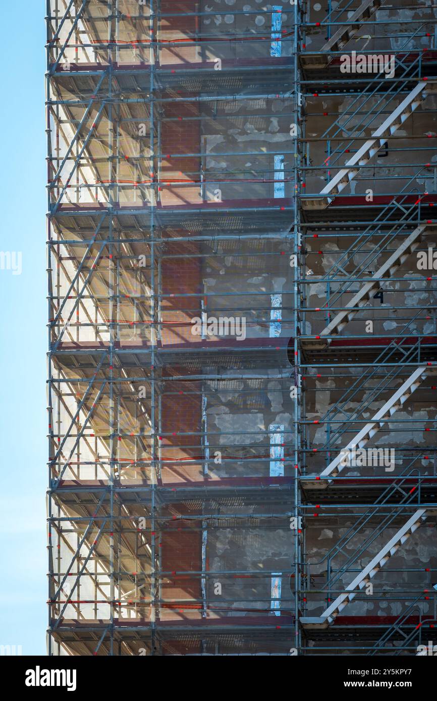 Scaffold sheeting net wrapped apartments building during insulation in ...