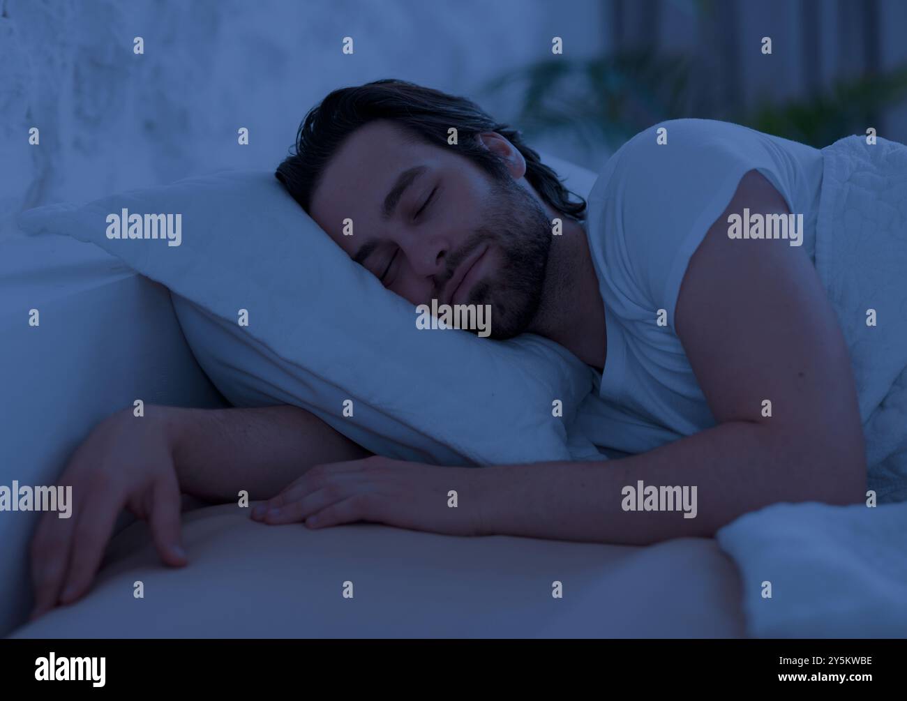 Man sleeping alone bed smiling hi-res stock photography and images - Alamy