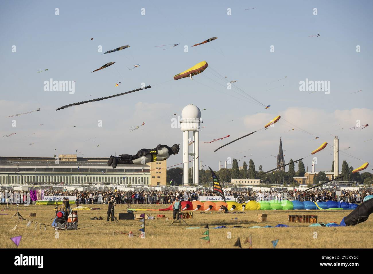 Flying kite in the shape of Batman in front of the tower at the kite ...