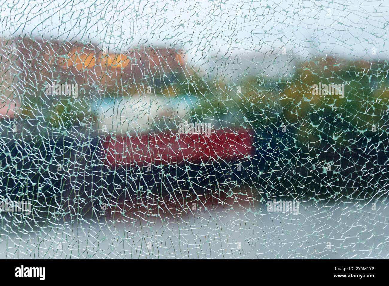A shattered glass texture beautifully blurs the vibrant colors of the ...