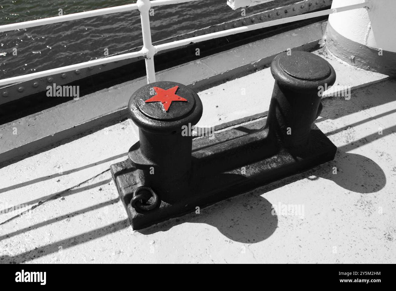 Two iron bollards on a ship Stock Photo - Alamy