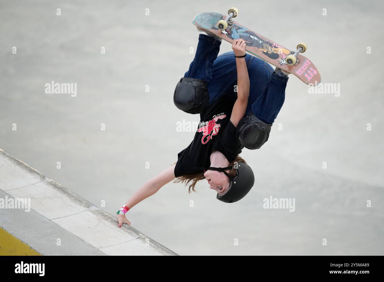 Lilly Strachan of England in action during the women finals at the Park ...