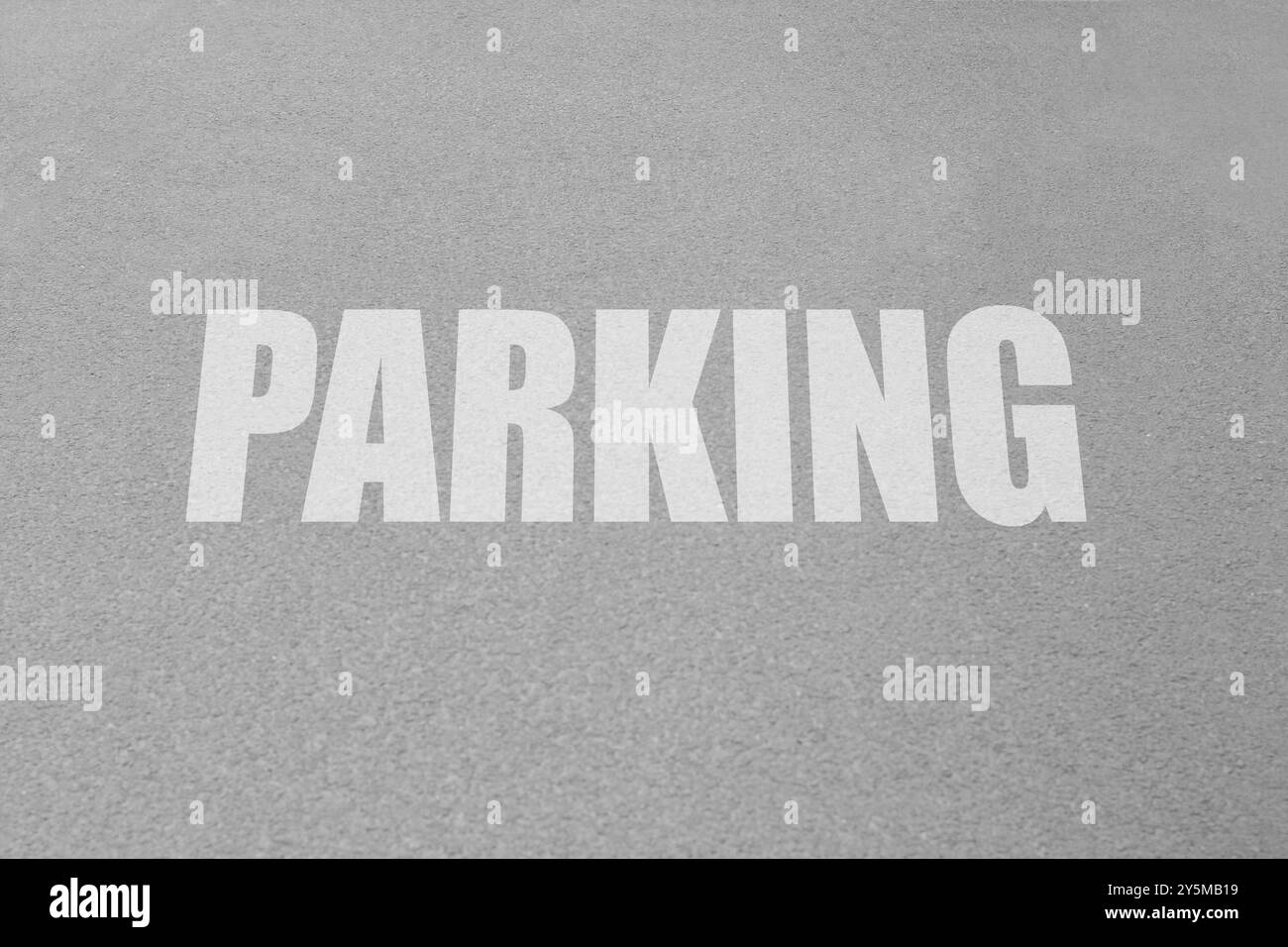 Parking lot. Word Parking written on asphalt Stock Photo - Alamy