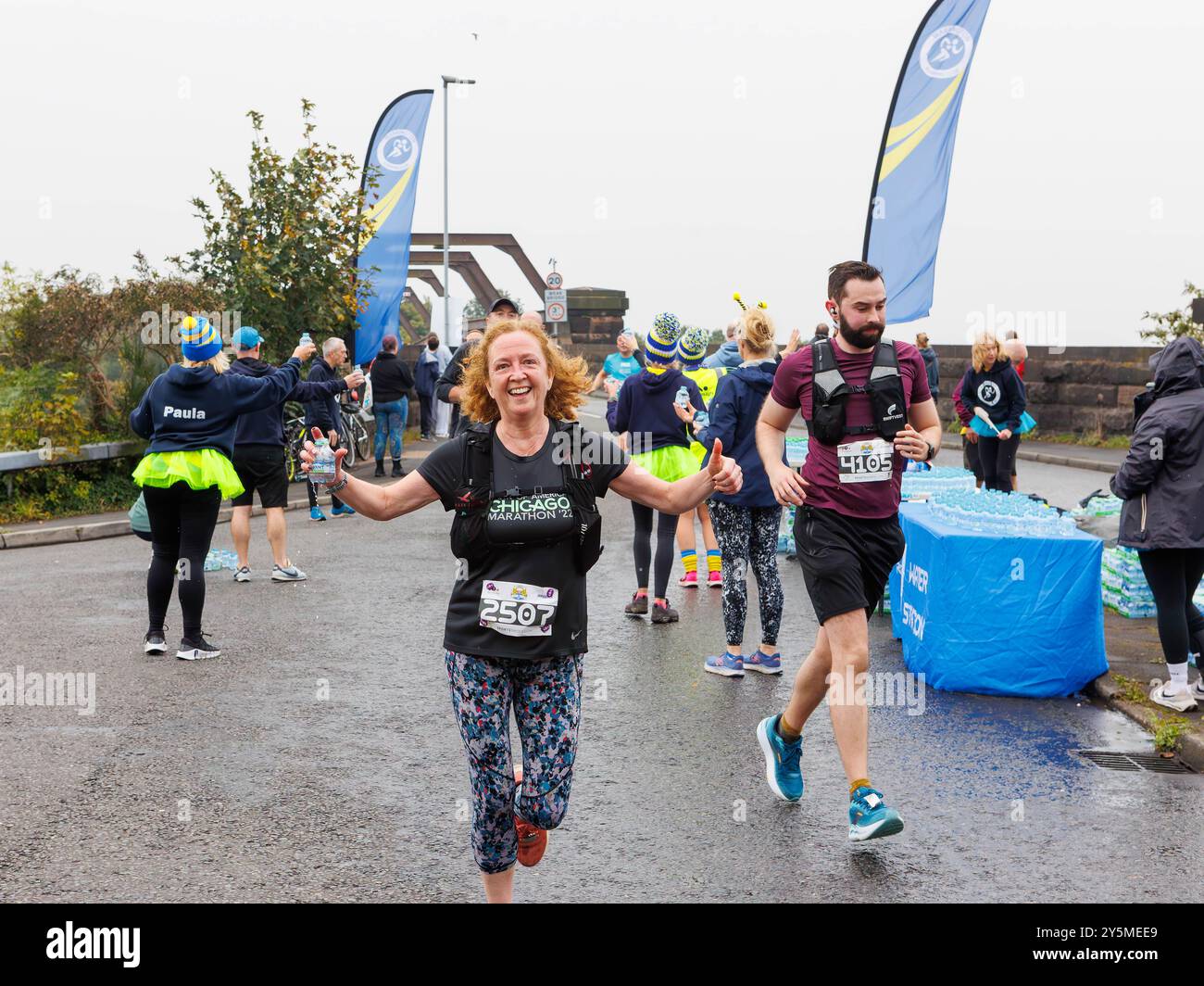 Athlete people handing out water hi-res stock photography and images ...