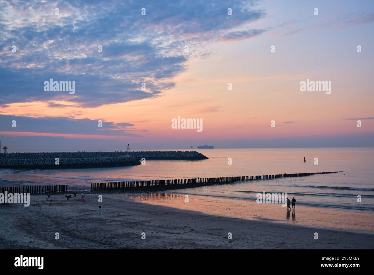 The sun setting over Cadzand beach in Zeeland, Southern Netherlands ...