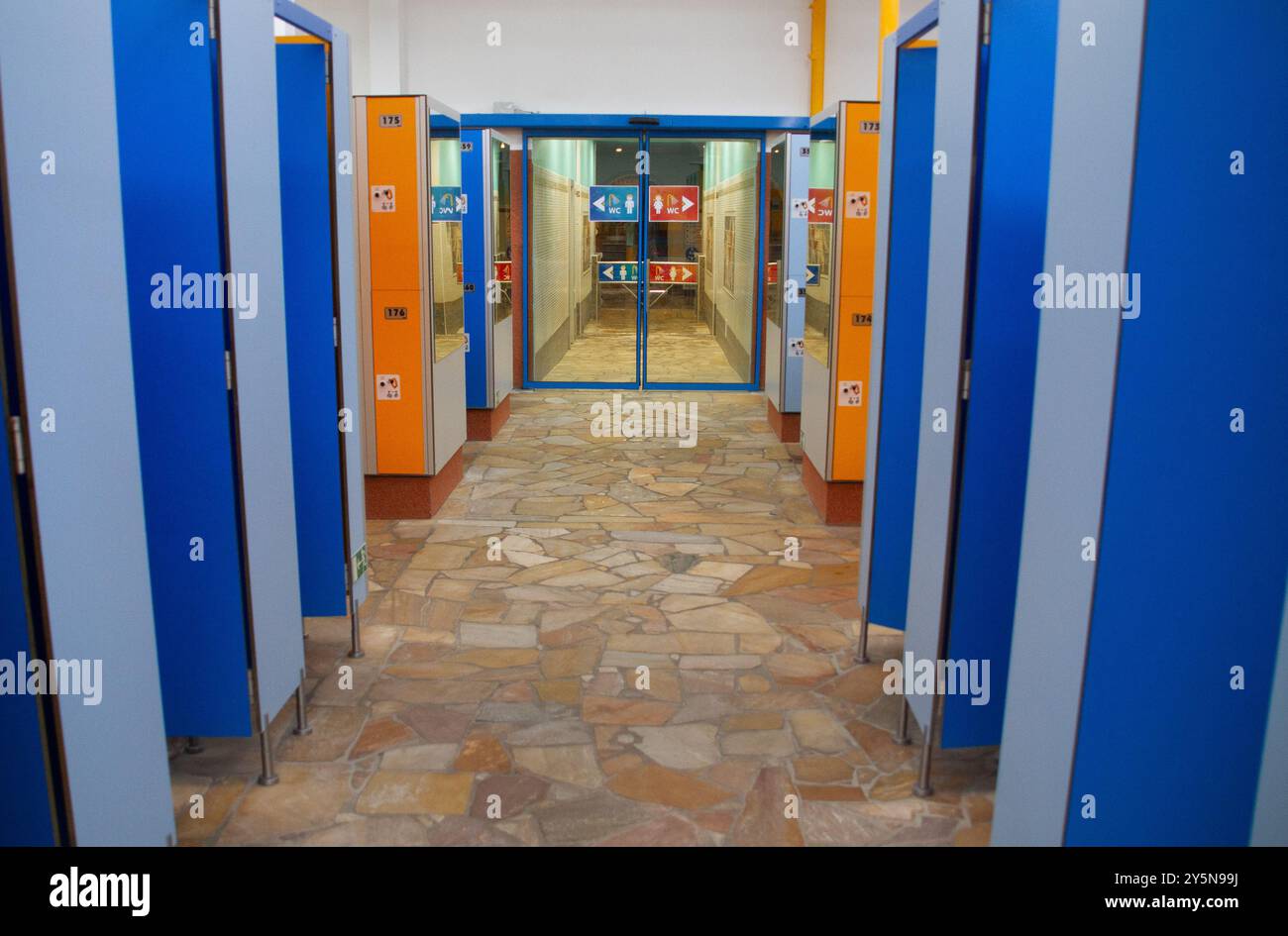 Changing cabon in swimming pool, entry floor with cabin, orange and ...