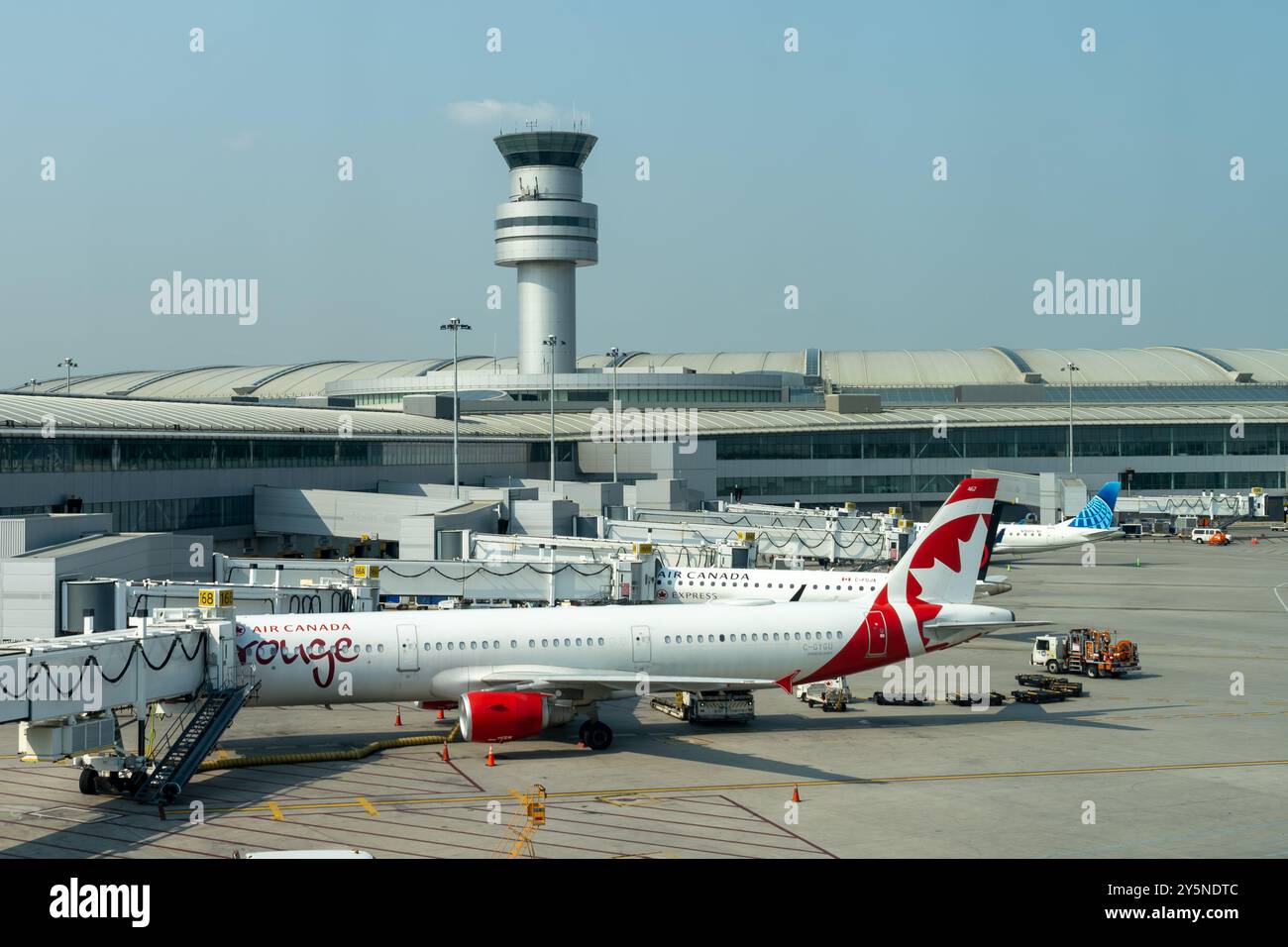 An Air Canada rouge plane parked at Toronto’s Pearson International ...