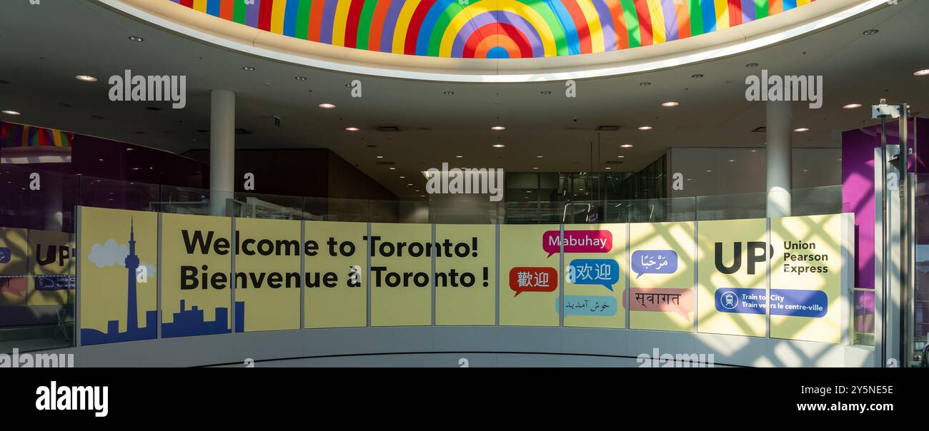 : Multilingual “Welcome to Toronto” sign in Toronto’s Pearson ...