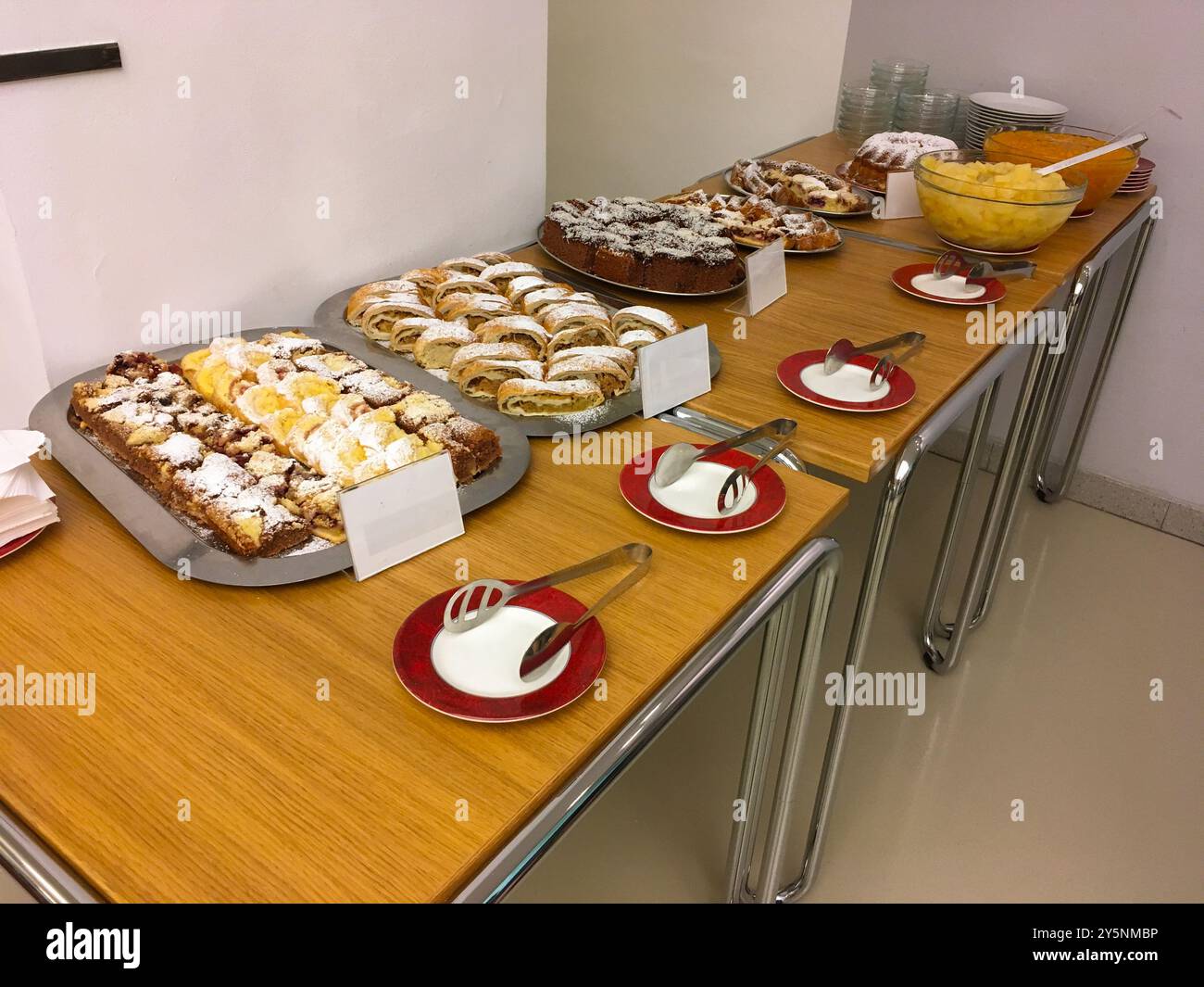 Variety of food and drinks served at dining table during breakfast at ...