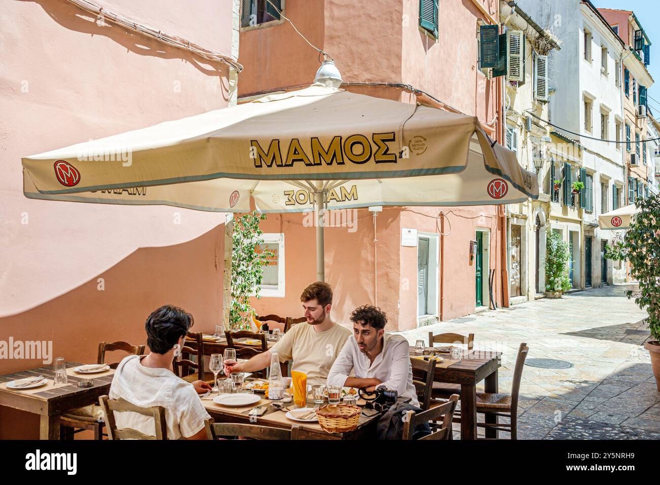 Corfu Greece,Old Town,men friends,drinking dining,North African man ...