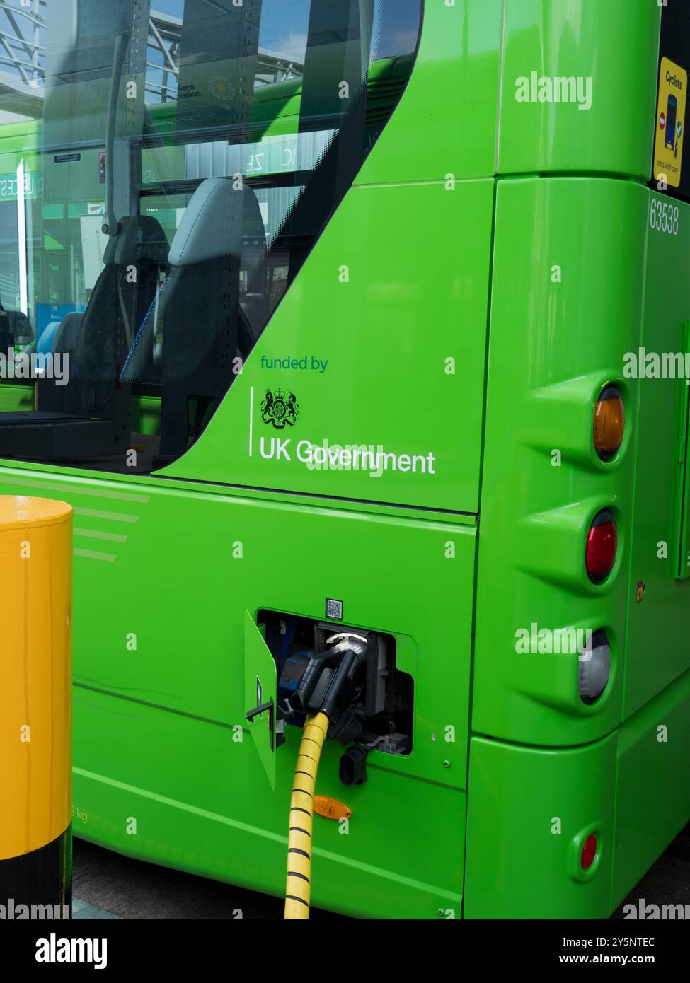 Electric bus charging close-up detail Stock Photo - Alamy