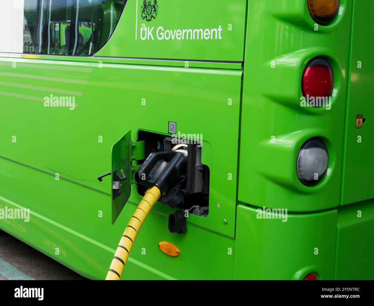 Electric bus charging close-up detail Stock Photo - Alamy