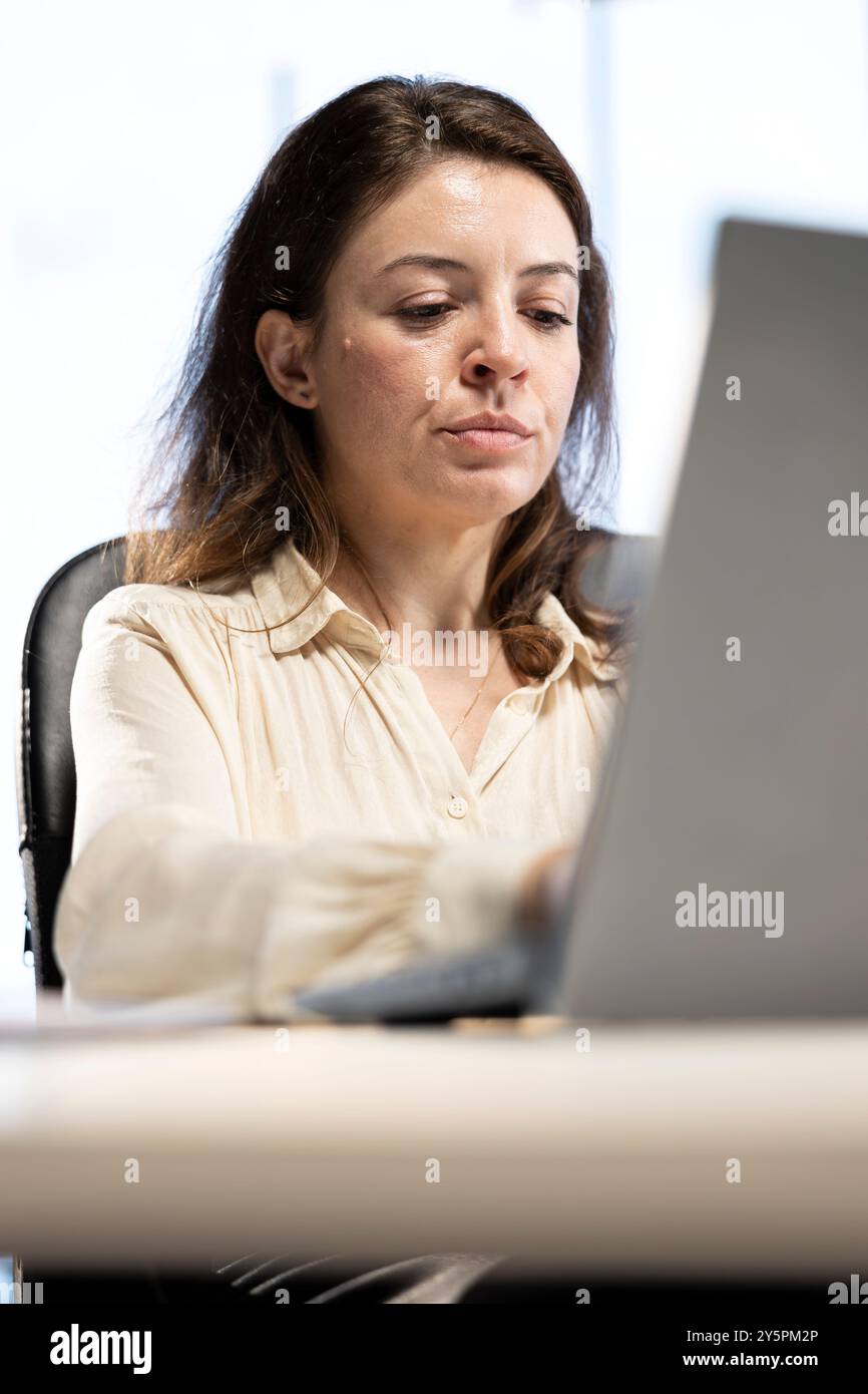 Powerful female entrepreneur focuses on strategic planning, setting a ...