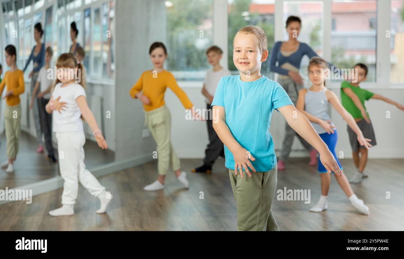 Group of children dancing contemporary dance Stock Photo - Alamy