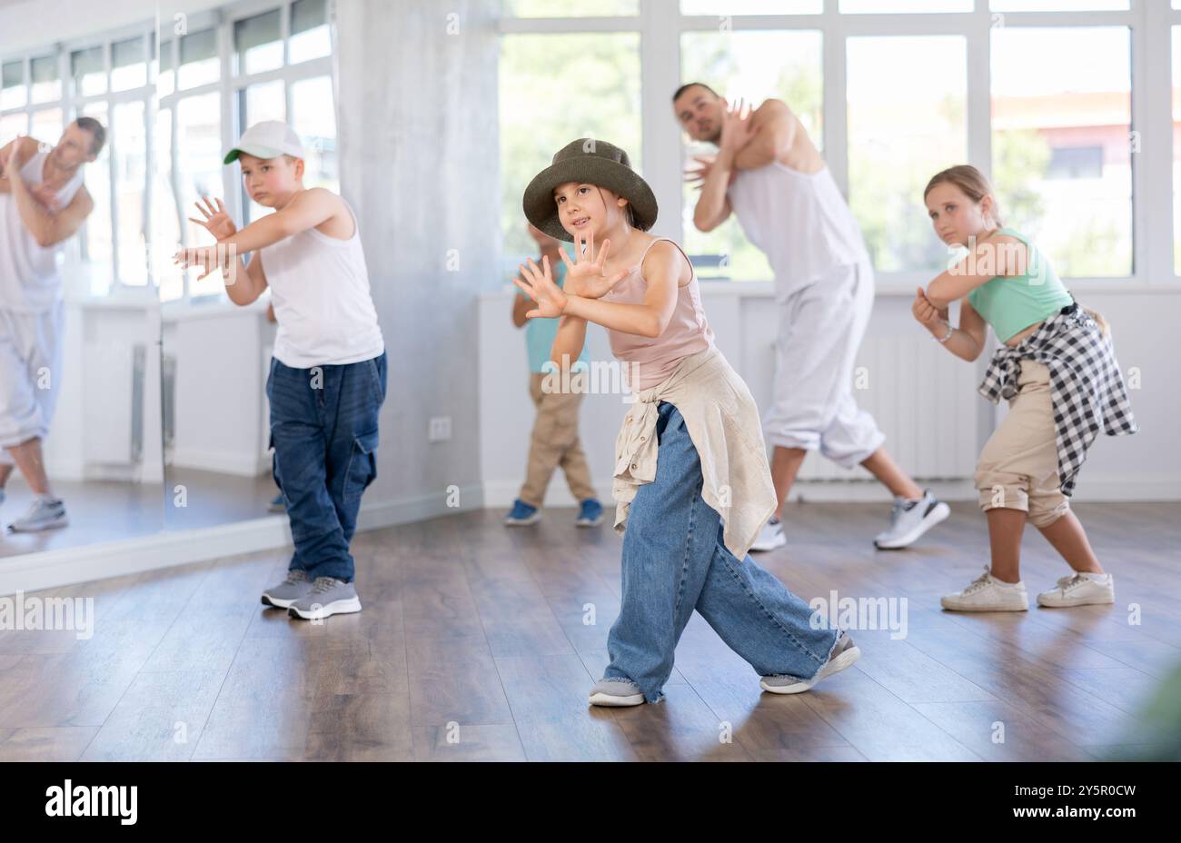 Tween girl mastering krump dance in children dance studio Stock Photo ...