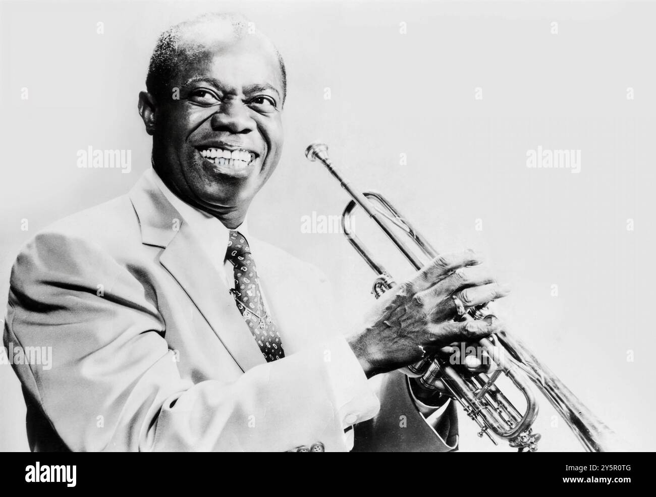 Jazz Legend Louis Armstrong with his trumpet, black and white publicity ...
