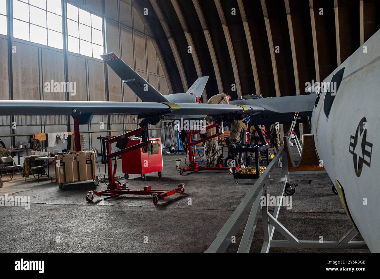 U.S. Air Force crew chiefs from the 147th Attack Wing perform ...