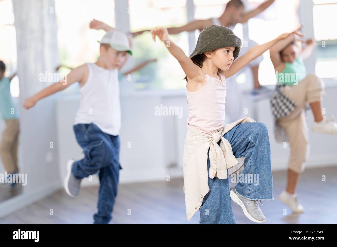 Girls and boys training hip hop in dance studio, dance classes for kids Stock Photo - Alamy