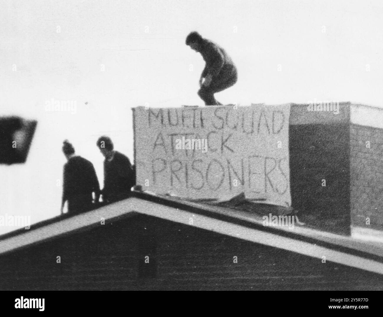 PRISONERS PROTEST ON THE ROOF OF ALBANY JAIL, ISLE OF WIGHT. PLACARD ...