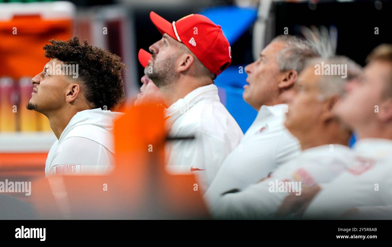 Kansas City Chiefs quarterback Patrick Mahomes, left, sits on the bench ...