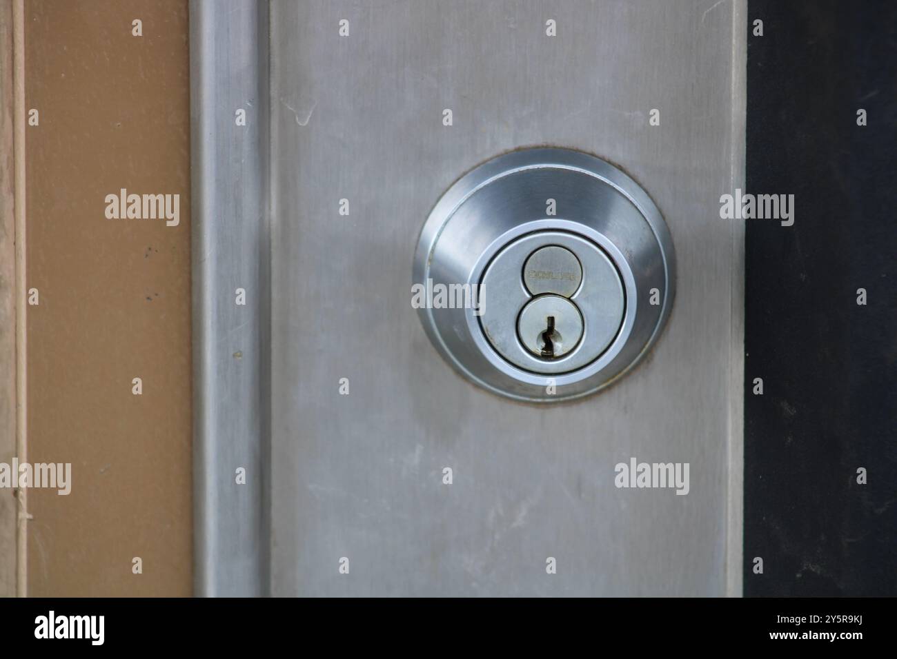 round silver lock with keyhole Stock Photo - Alamy