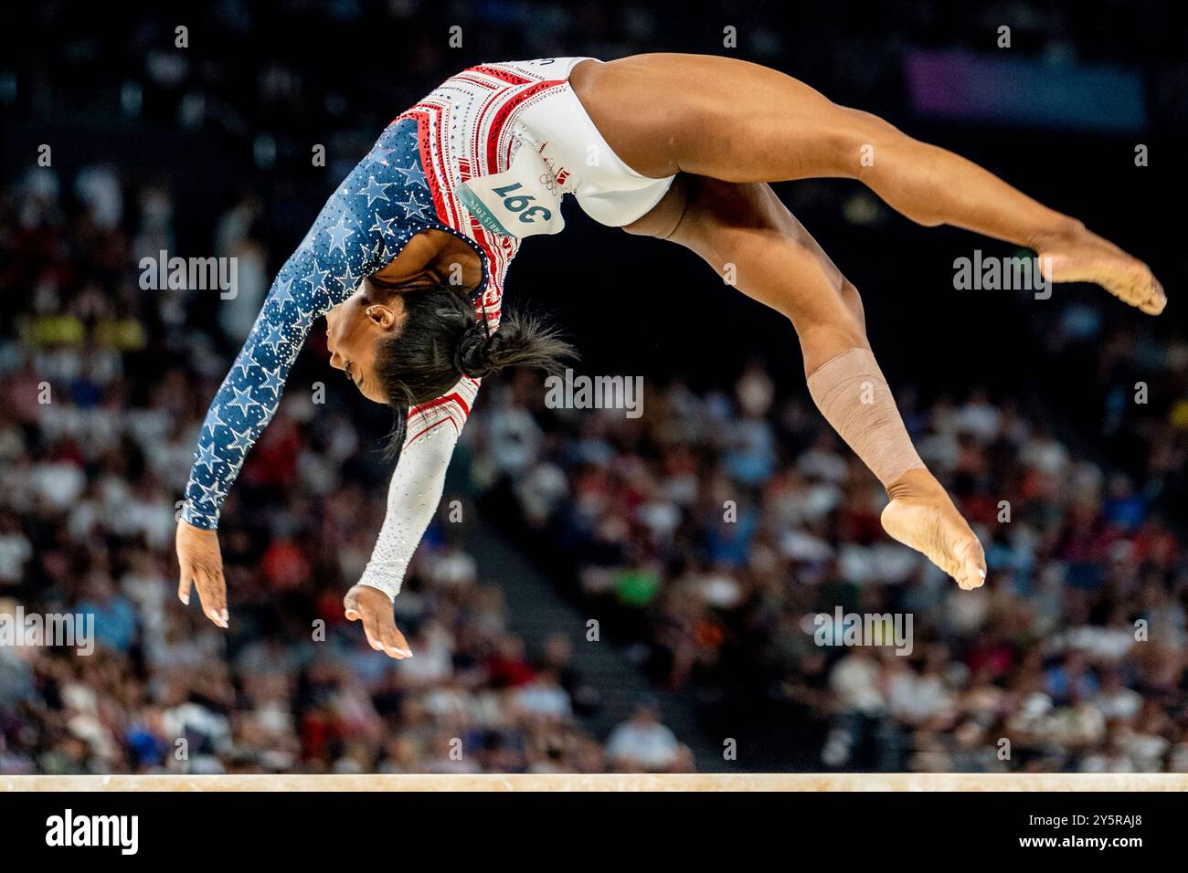 Simone Biles USA) competes on the balance beam during the Women's ...