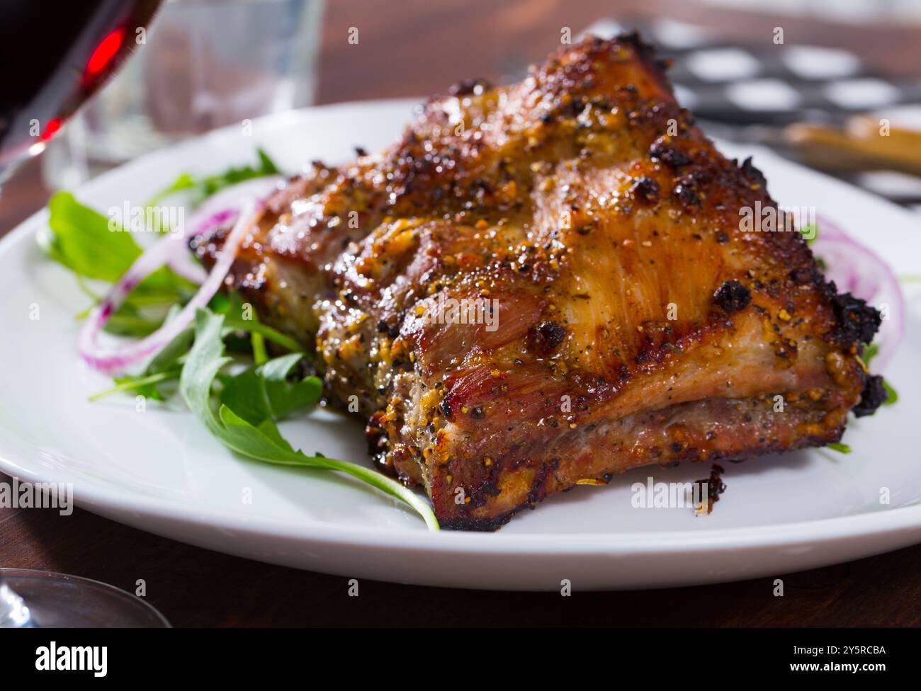 Roasted rack of pork Stock Photo - Alamy