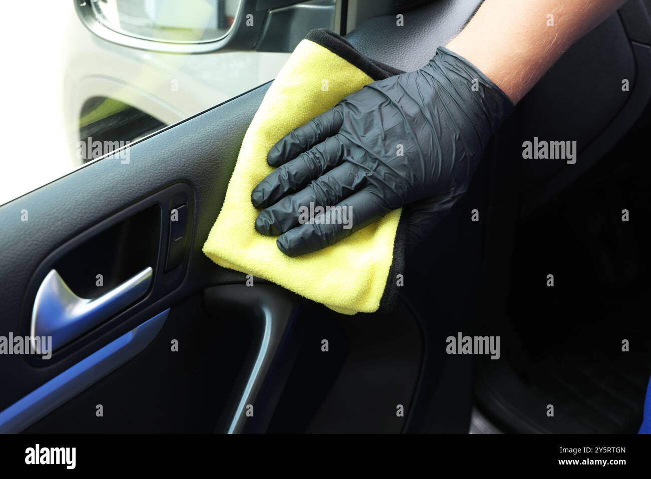 Closeup man cleaning dirty car hi-res stock photography and images - Alamy