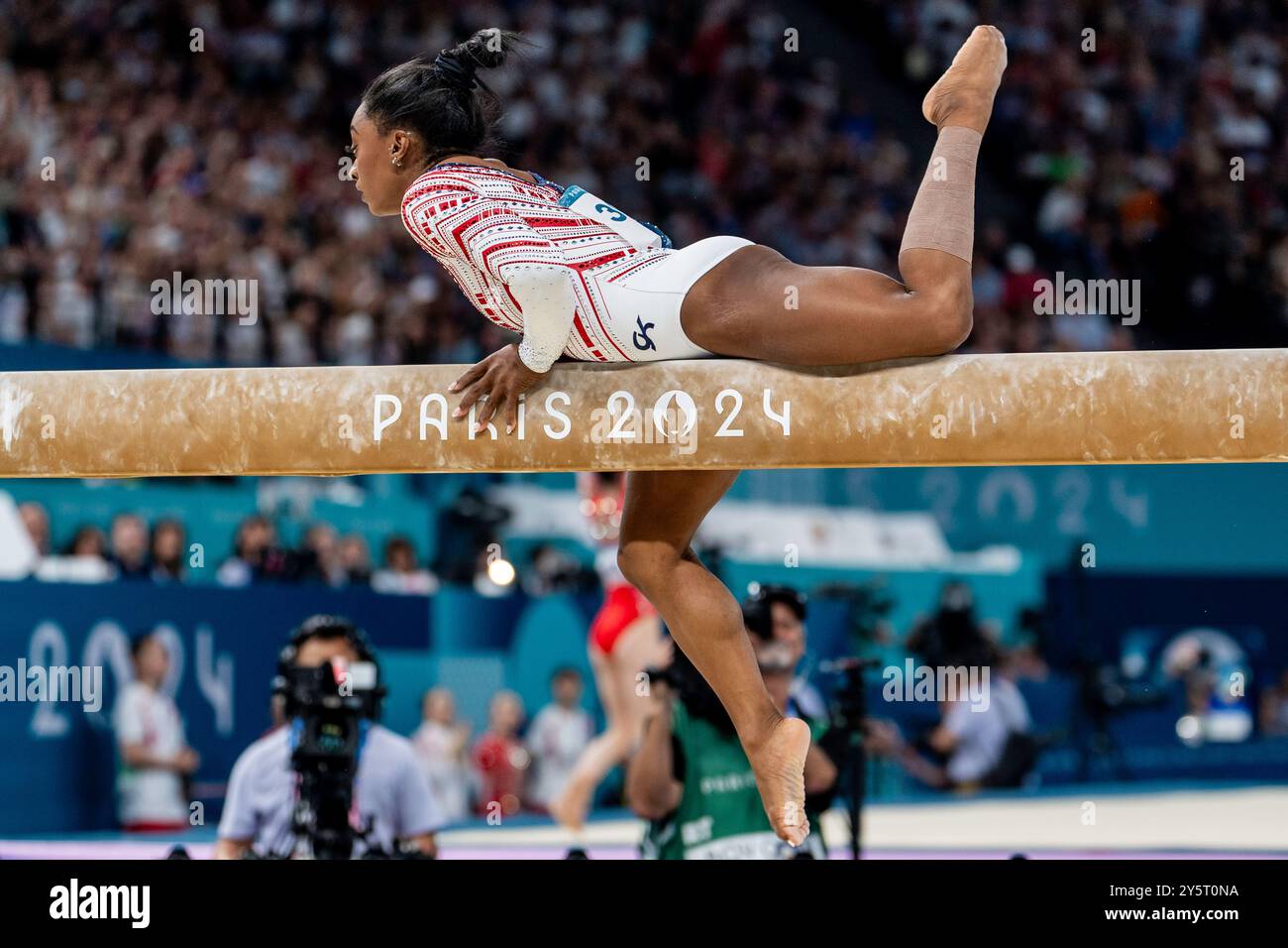 Simone Biles USA) competes on the balance beam during the Women's ...