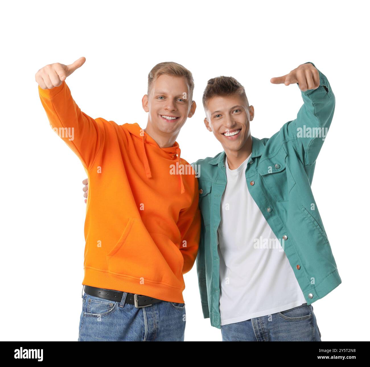 Two young brothers having fun on white background Stock Photo - Alamy