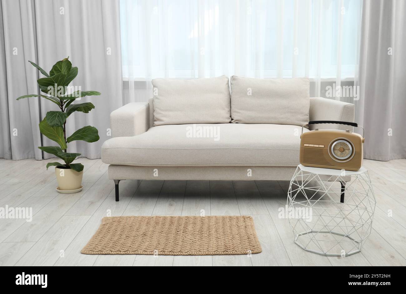 Comfortable couch in living room. Interior design Stock Photo - Alamy