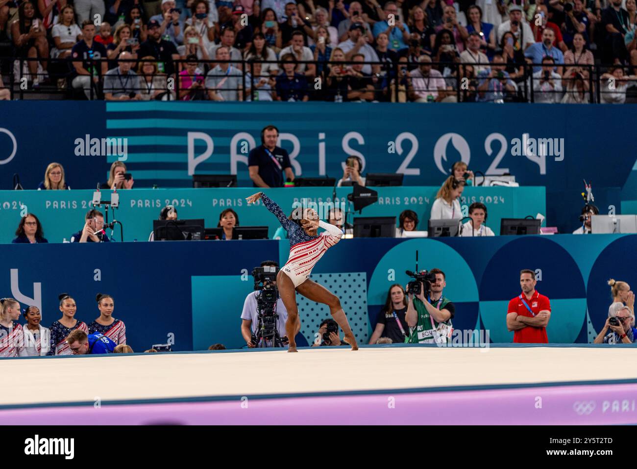 Simone Biles USA) competes on the floor exercise during the Women's ...