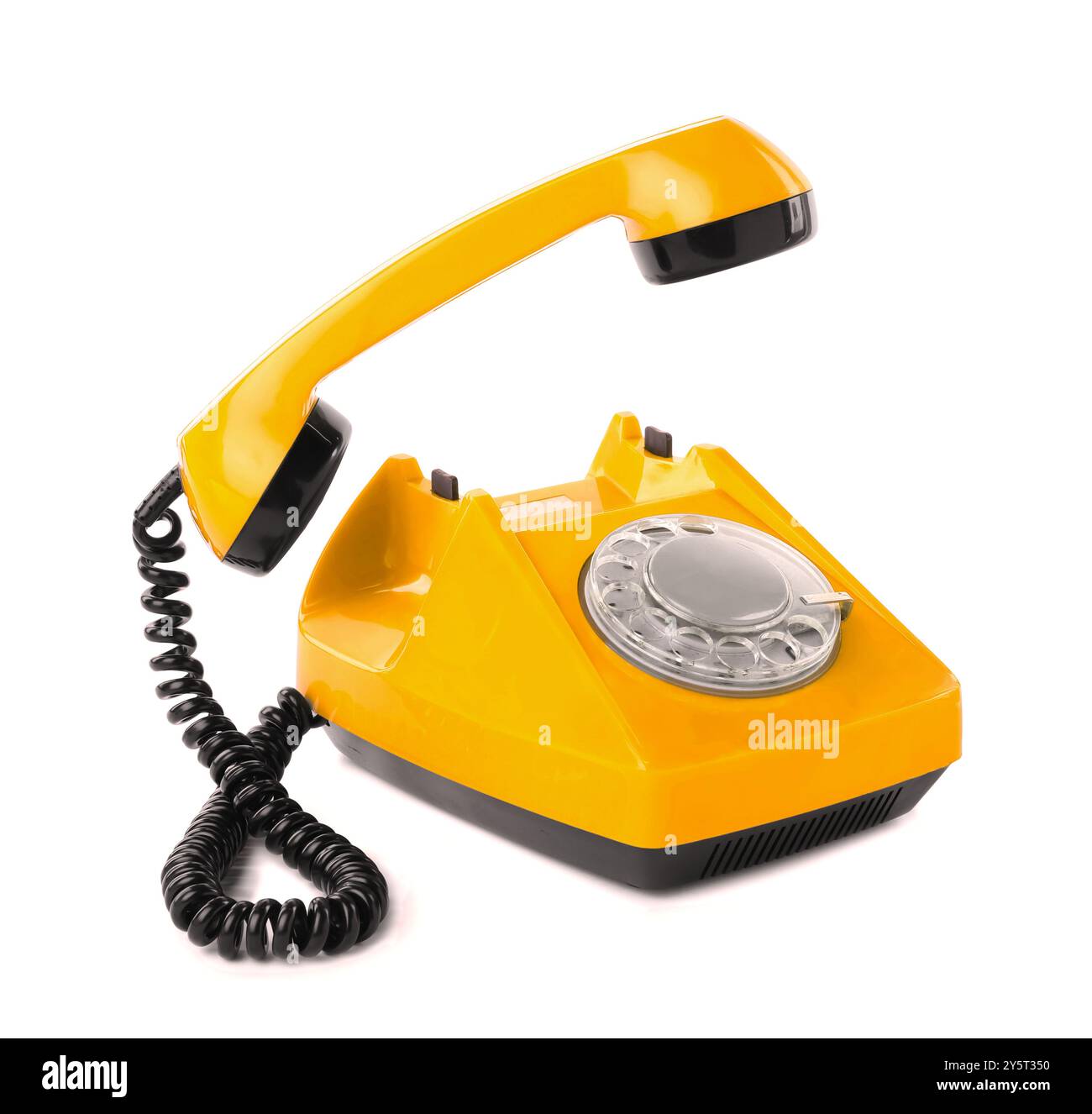 Old yellow telephone with rotary dial isolated on white Stock Photo - Alamy