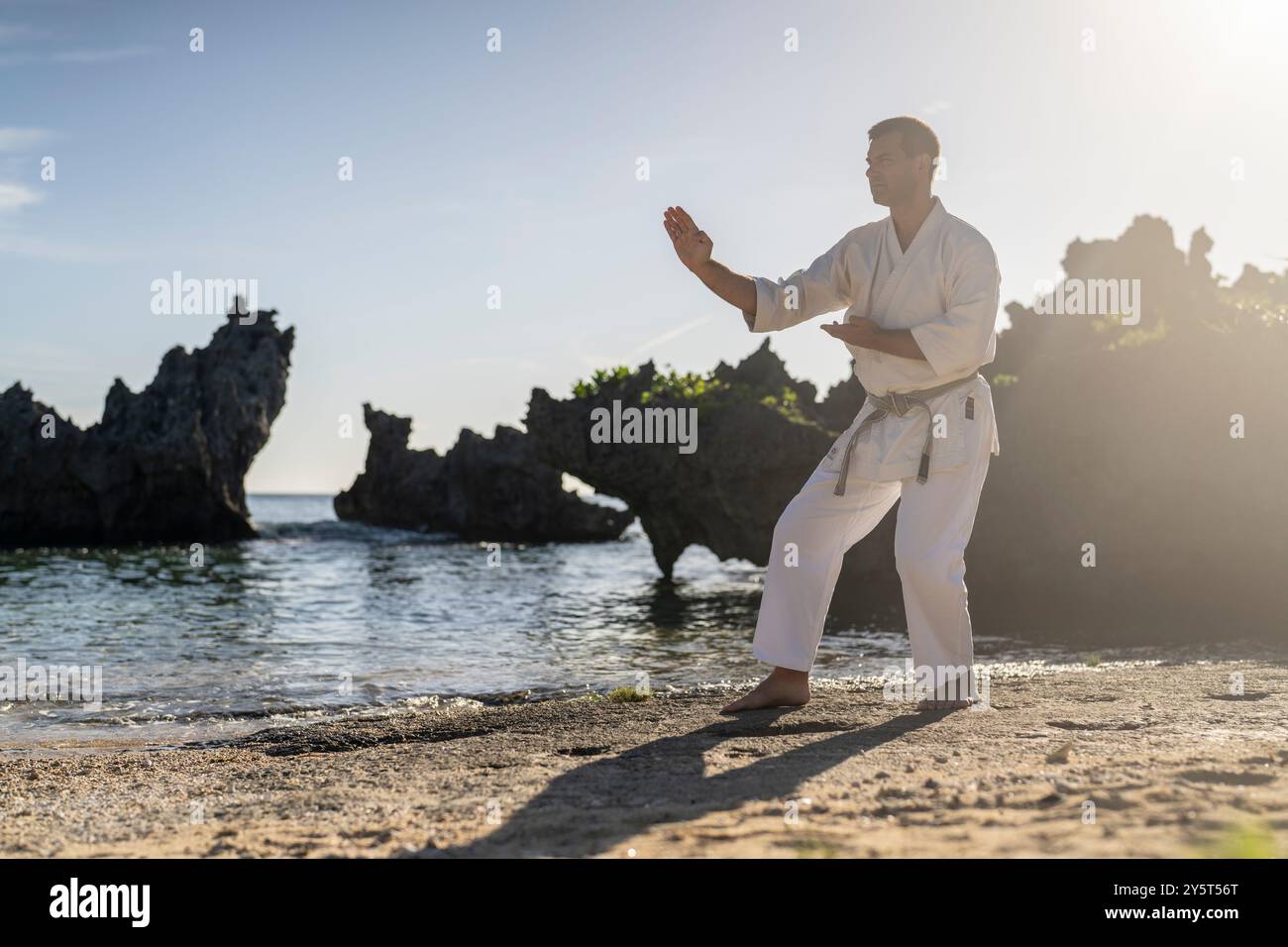 Karate training on the beach in Okinawa, birthplace of karate Stock ...
