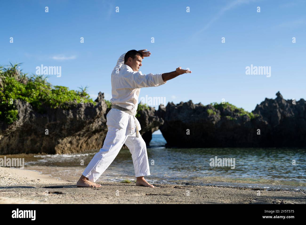 Karate training on the beach in Okinawa, birthplace of karate Stock ...