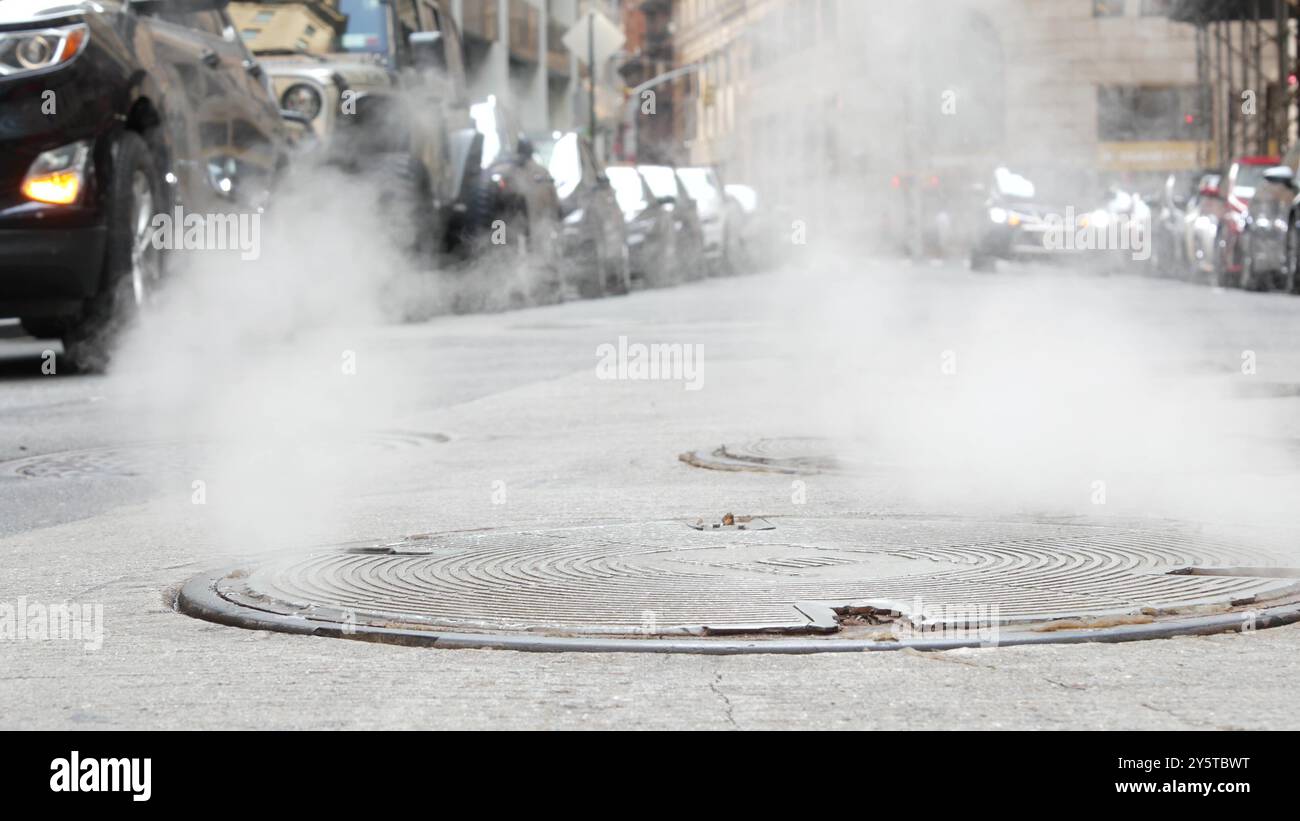 Steam from sewer manhole in hi-res stock photography and images - Alamy