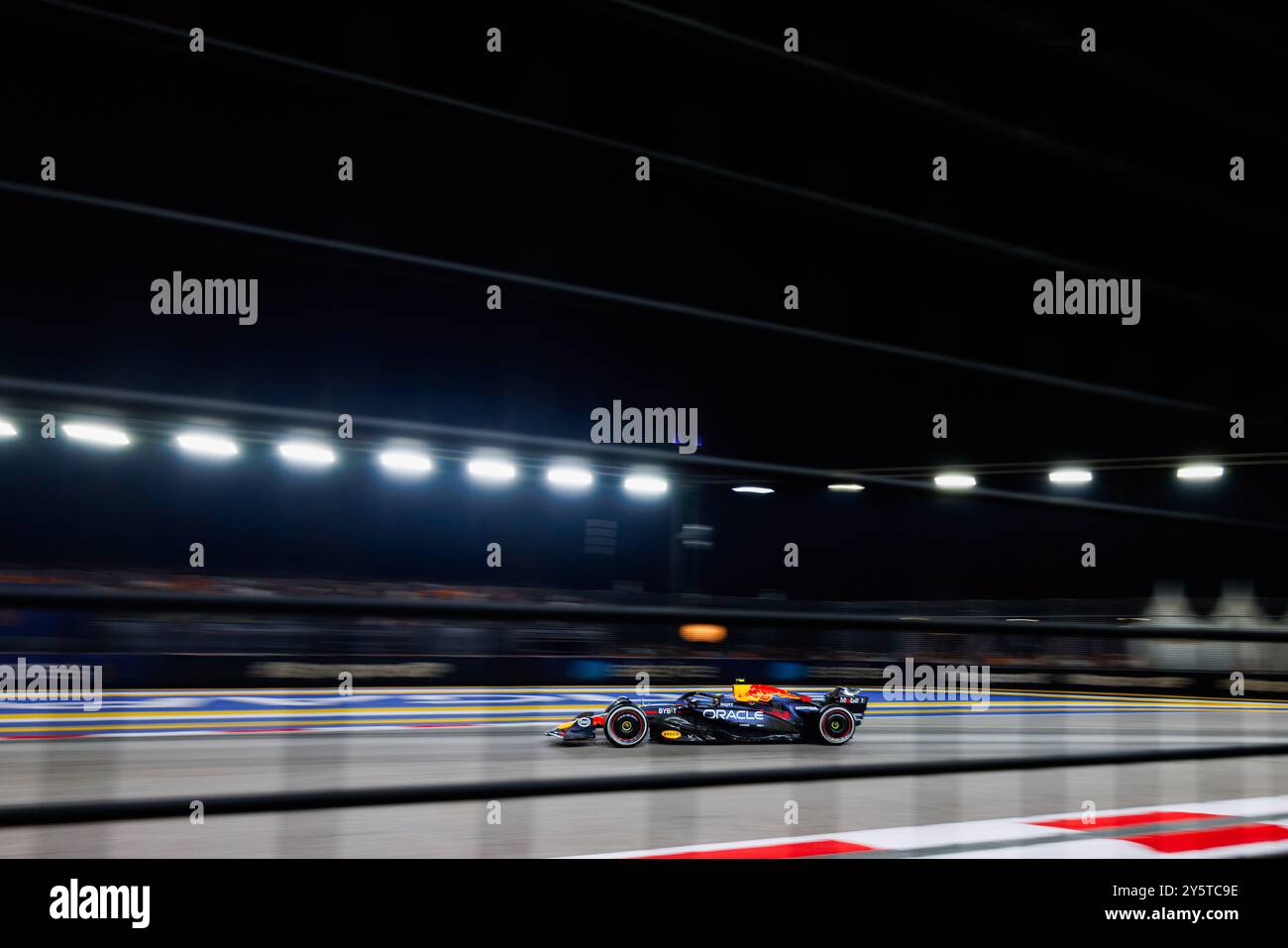 Singapore, Singapore. 22nd Sep, 2024. Sergio Perez of Mexico drives the (11) Oracle Red Bull ...