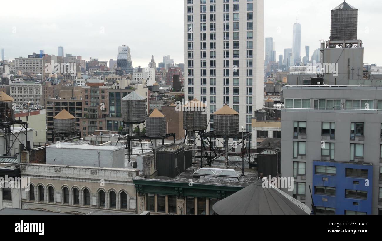 New York City Manhattan cityscape. Rooftop water towers, residential ...