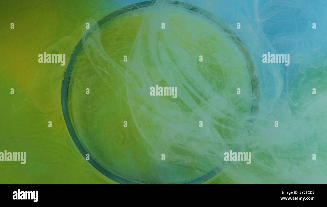 Smoke circle. Water twirl. Blue green ink spill color mist blend paint ...
