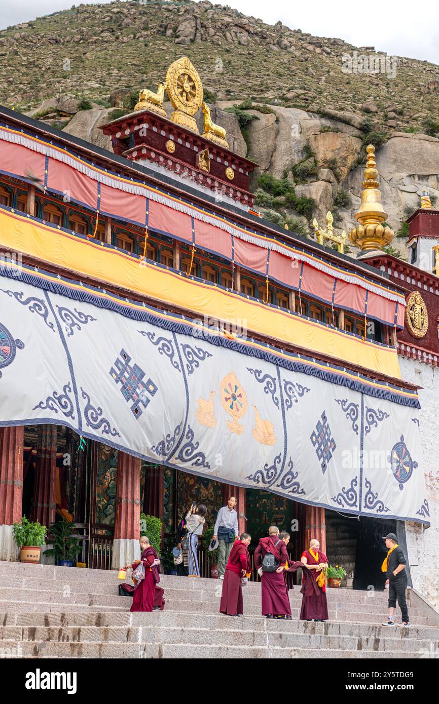 LHASA, TIBET, China - MAY 1, 2022: Monks leave the main assembly hall ...